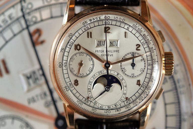 Wristwatch fetches record S$10 million at Swiss charity auction ...