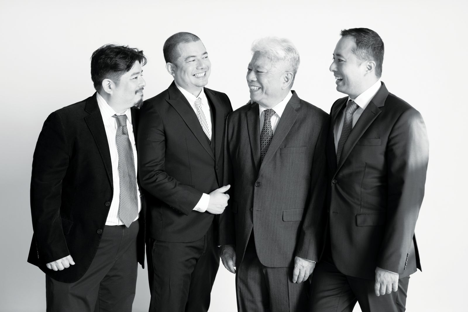 Charlie Rufino of NEO hands over the baton to his sons Raymond, JV and ...